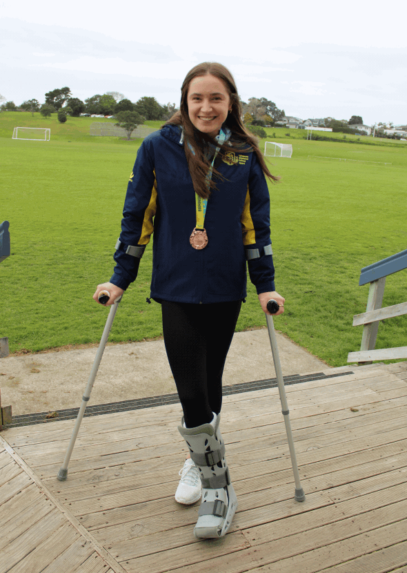Athletics: Alumna Imogen visits with her medal