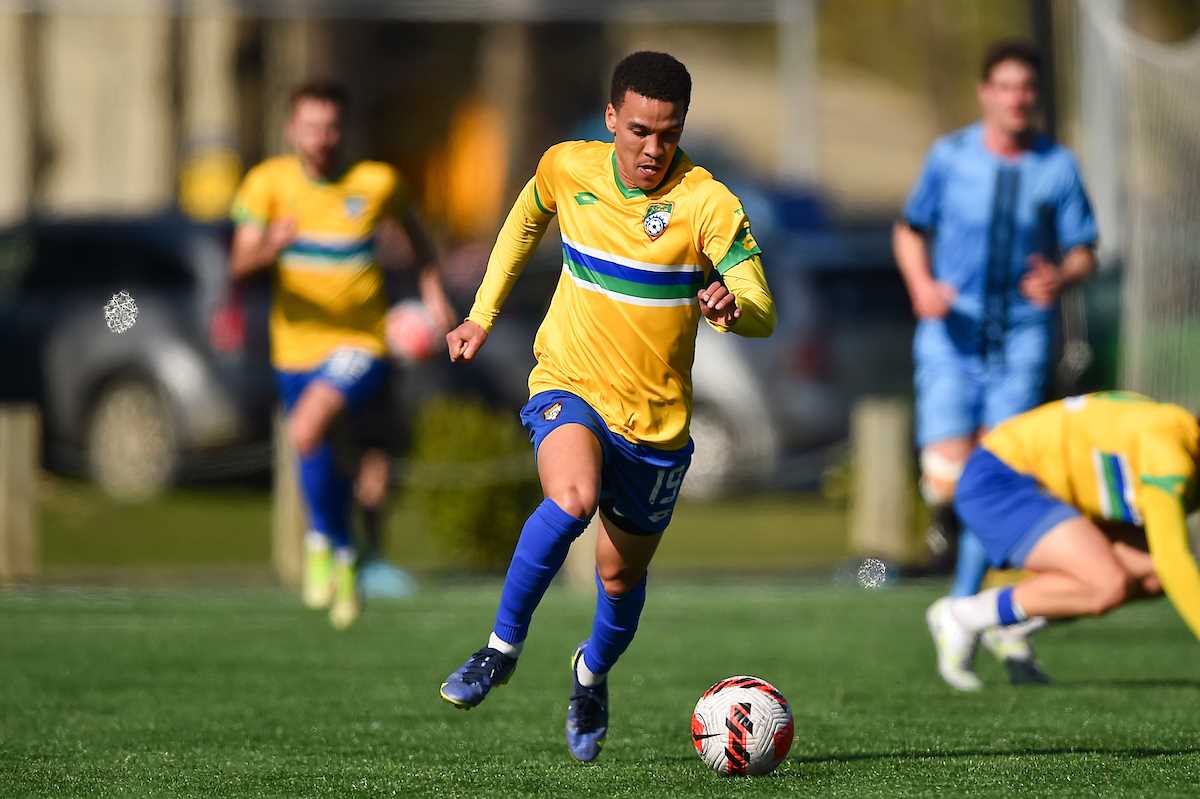 Who is in the men's Team of the Month for October?