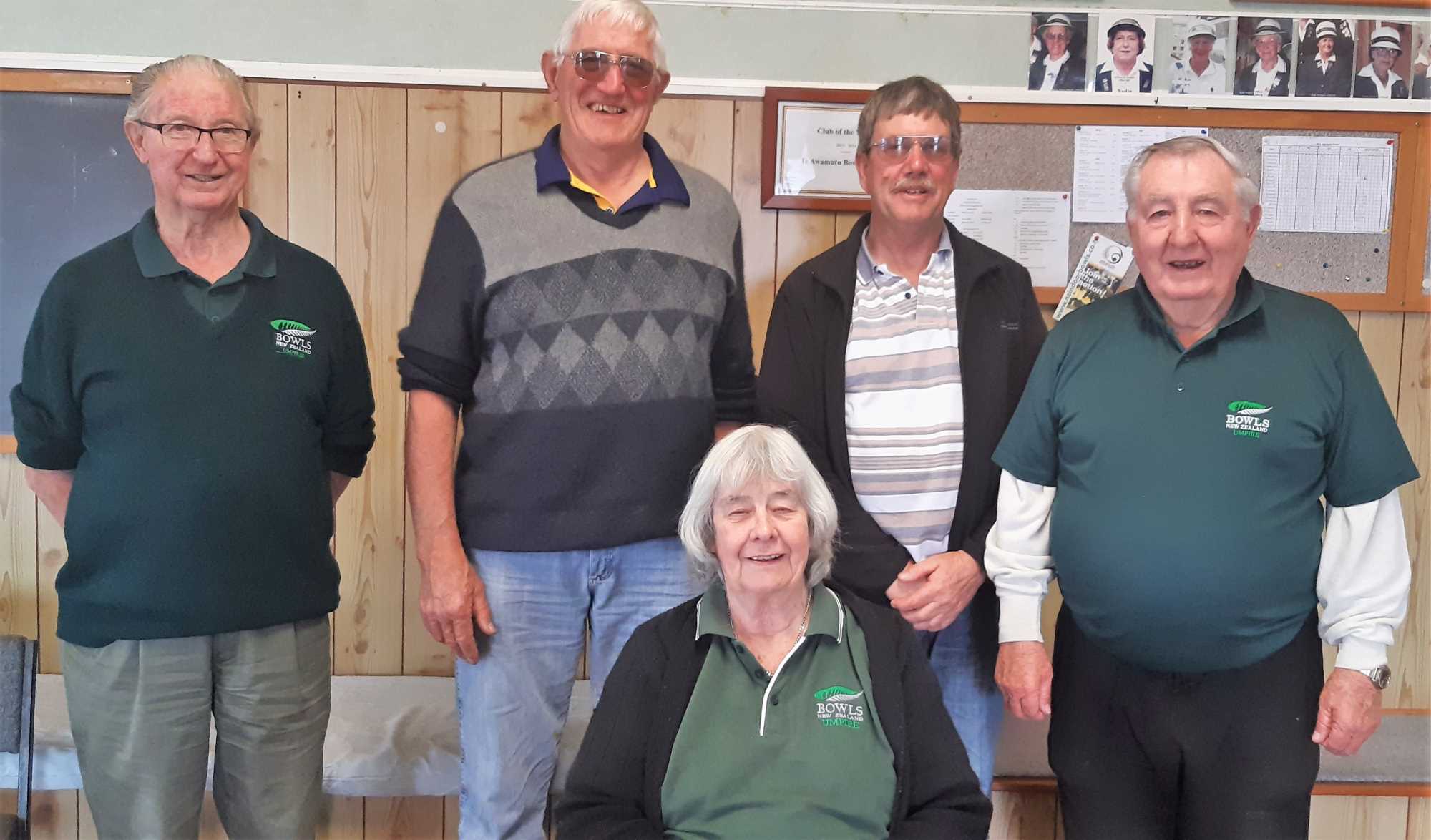 Two newly qualified Umpires